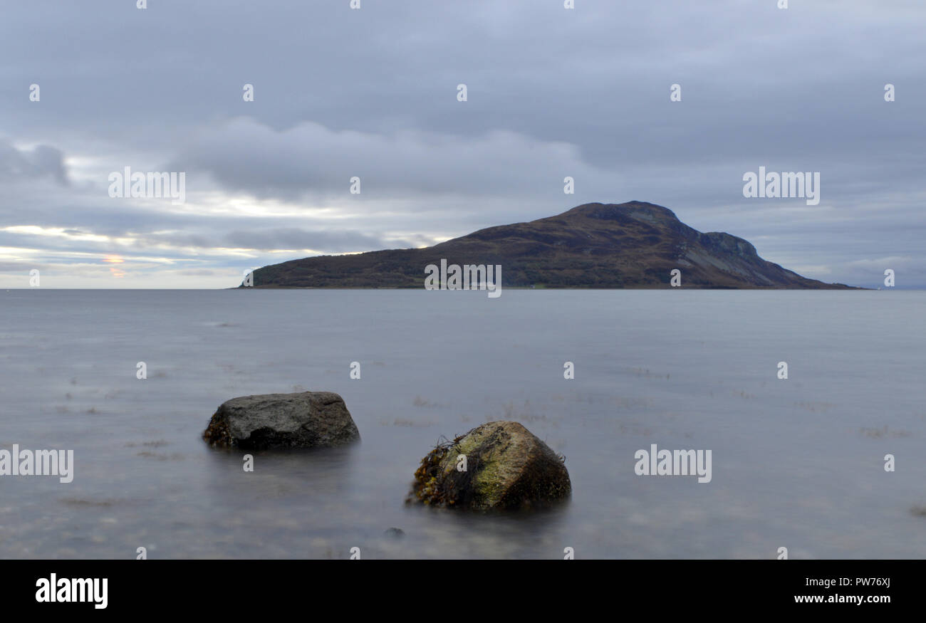 Cloudy sunrise from beach in Lamlash Stock Photo - Alamy