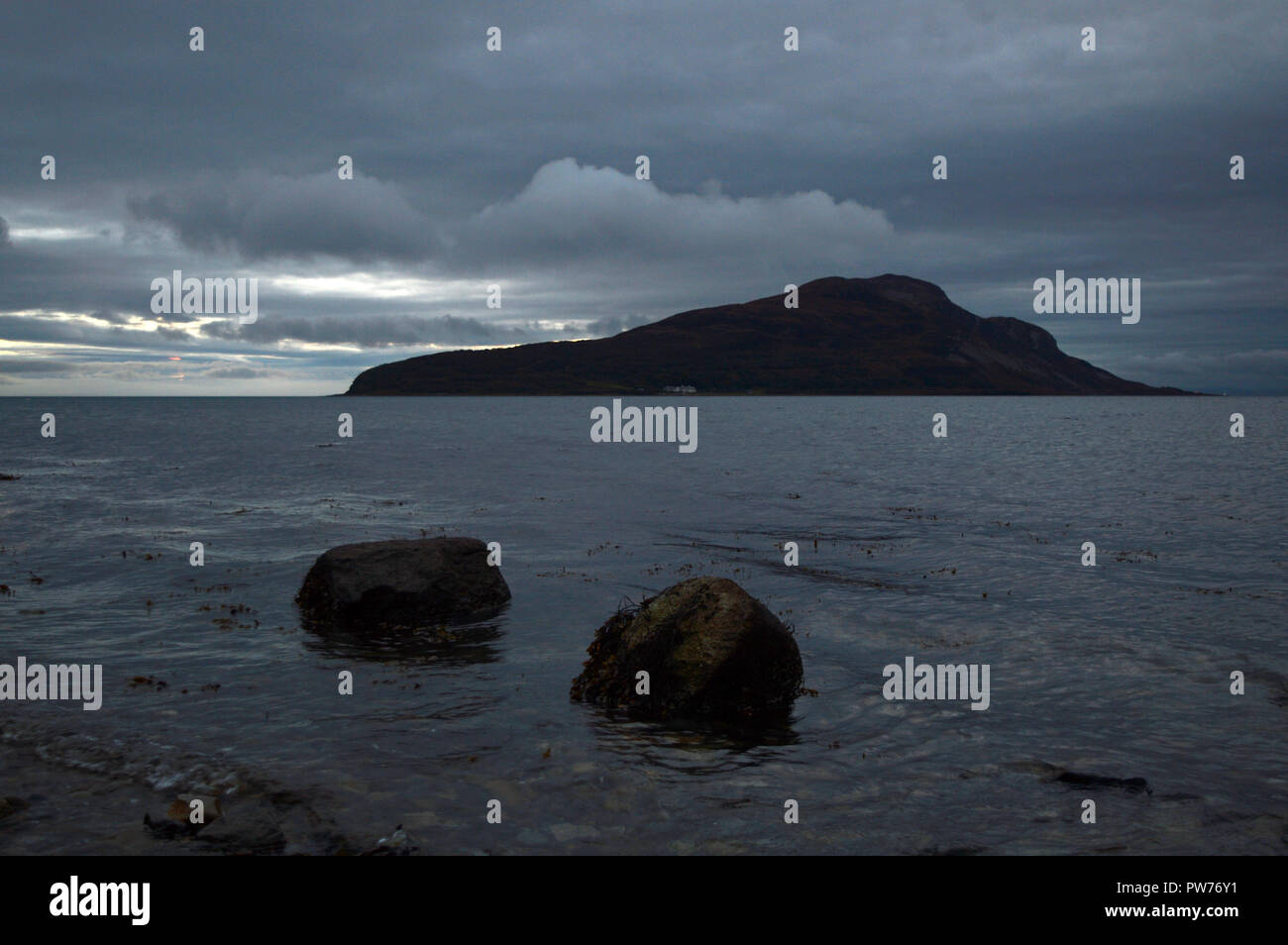 Cloudy sunrise from beach in Lamlash Stock Photo - Alamy