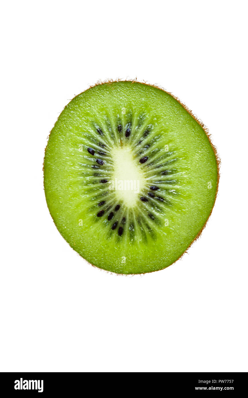 Slice of green kiwi isolated on white background. Tropical fruit close ...