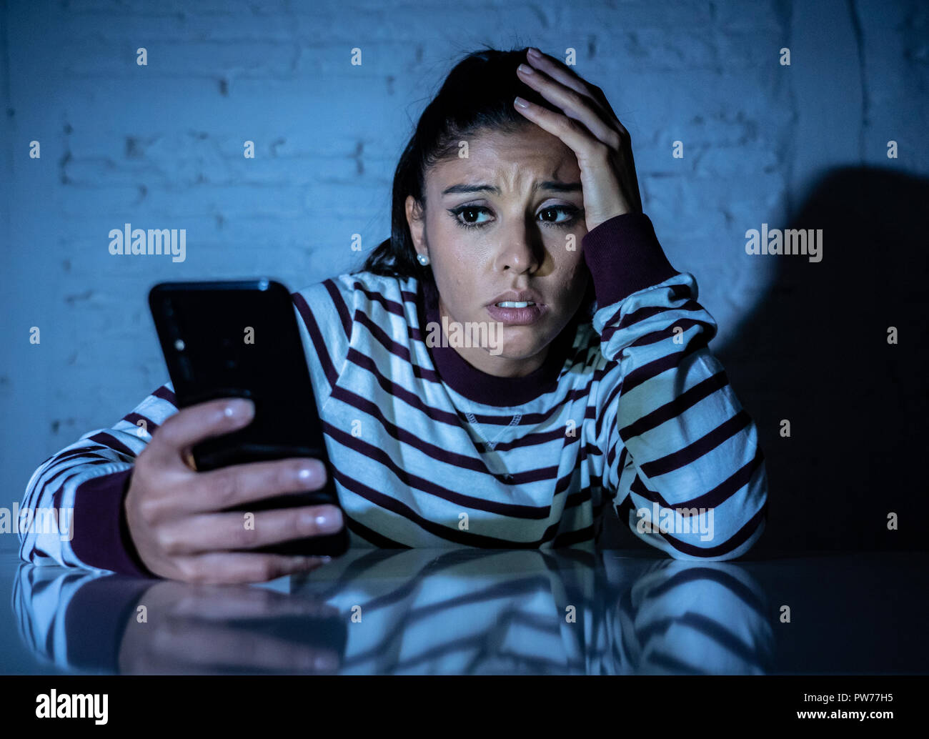 Internet blackmail woman scared hi-res stock photography and images - Alamy