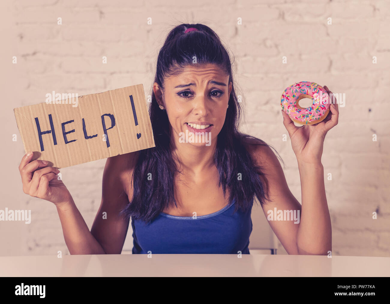 Woman and resisting chocolate hi-res stock photography and images - Alamy