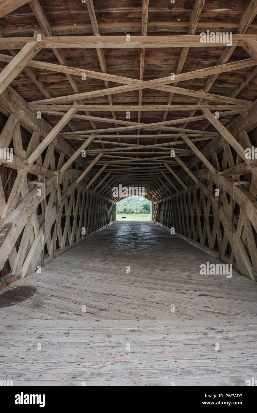 The interior latticework of the historic Holliwell covered bridge ...
