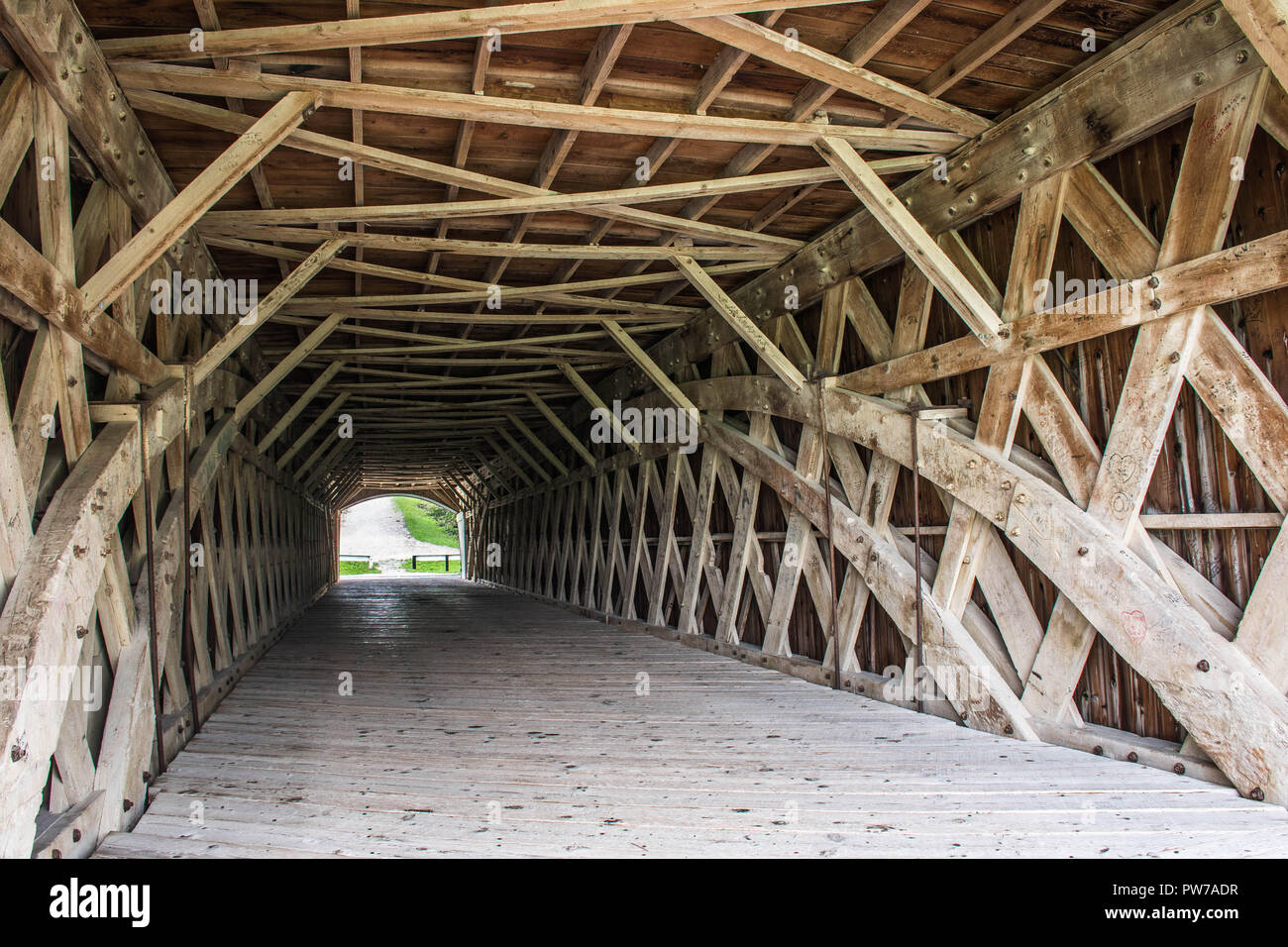 The interior latticework of the historic Holliwell covered bridge ...