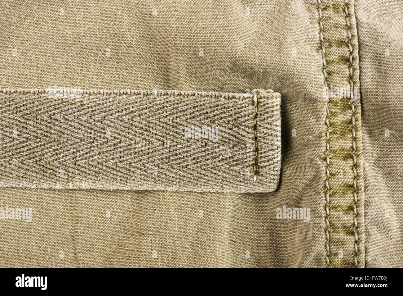 clothing items washed cotton fabric texture with seams, macro, close-up ...