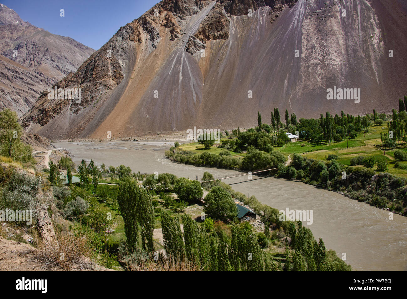 Beautiful village in the Bartang Valley, Pamirs, Tajikistan Stock Photo ...