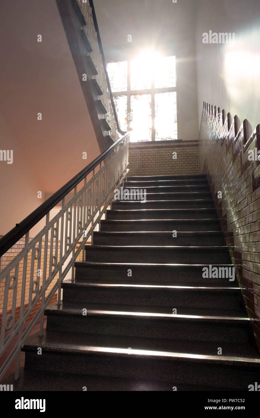 Entrance with a antique stairs and Sunlight shines through the windows ...