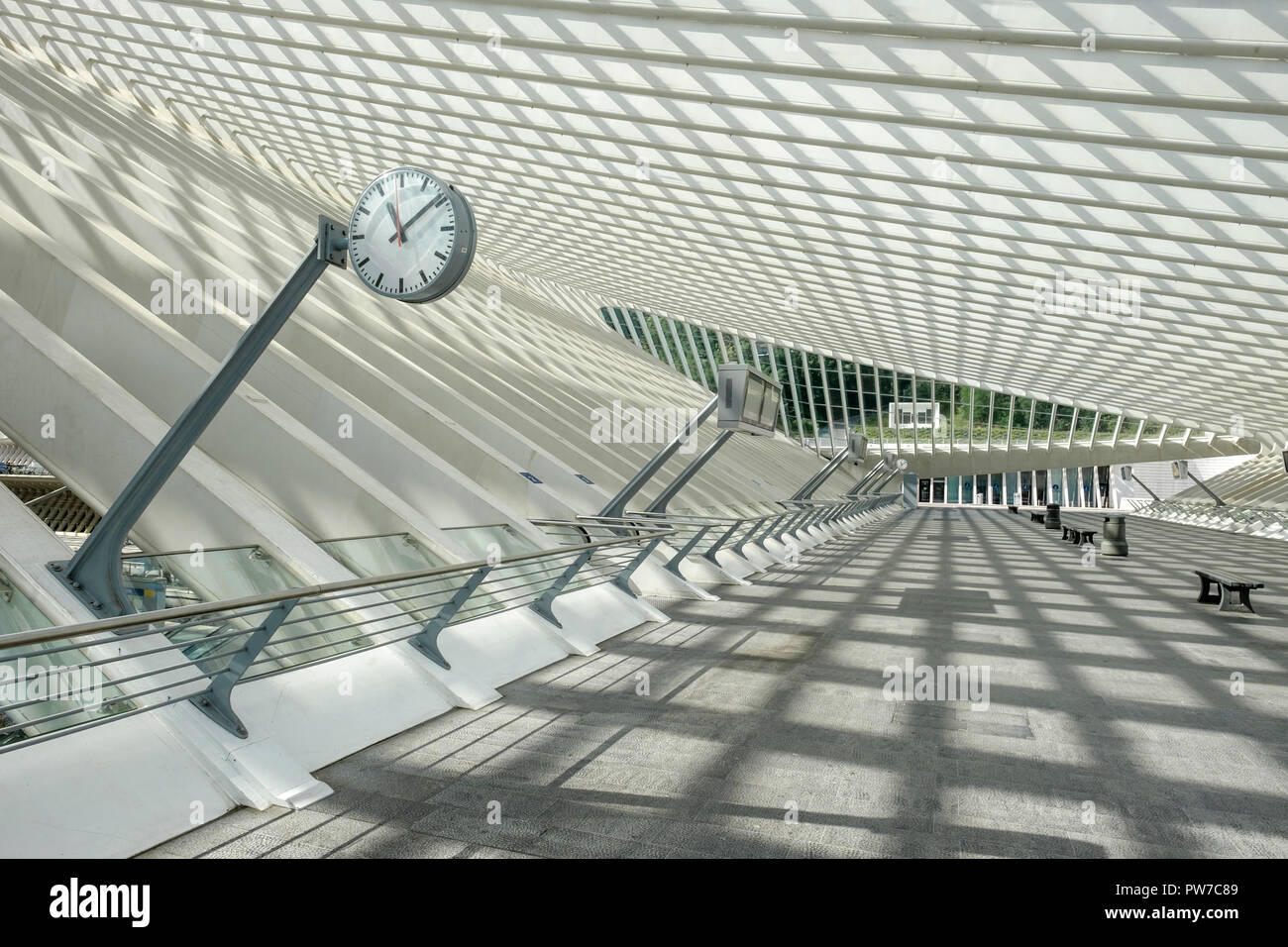 Clock in the modern train station of Liege in Belgium Stock Photo - Alamy