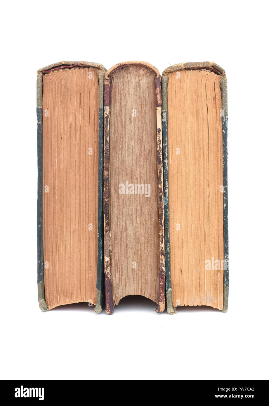 Studio scene of three old books against white background Stock Photo ...