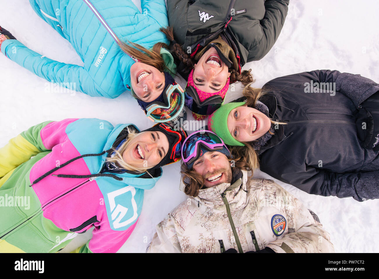 Happy group of people having fun on winter vacation - Friends witn snow ...