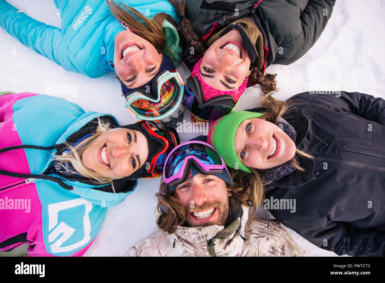 Happy group of people having fun on winter vacation - Friends witn snow ...