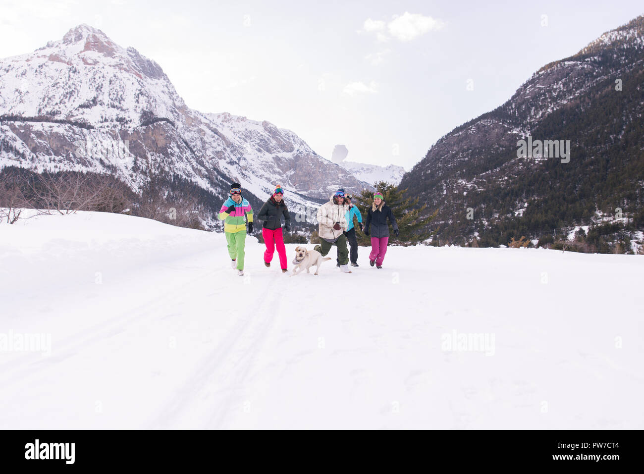 Happy group of people having fun on winter vacation - Friends witn snow ...