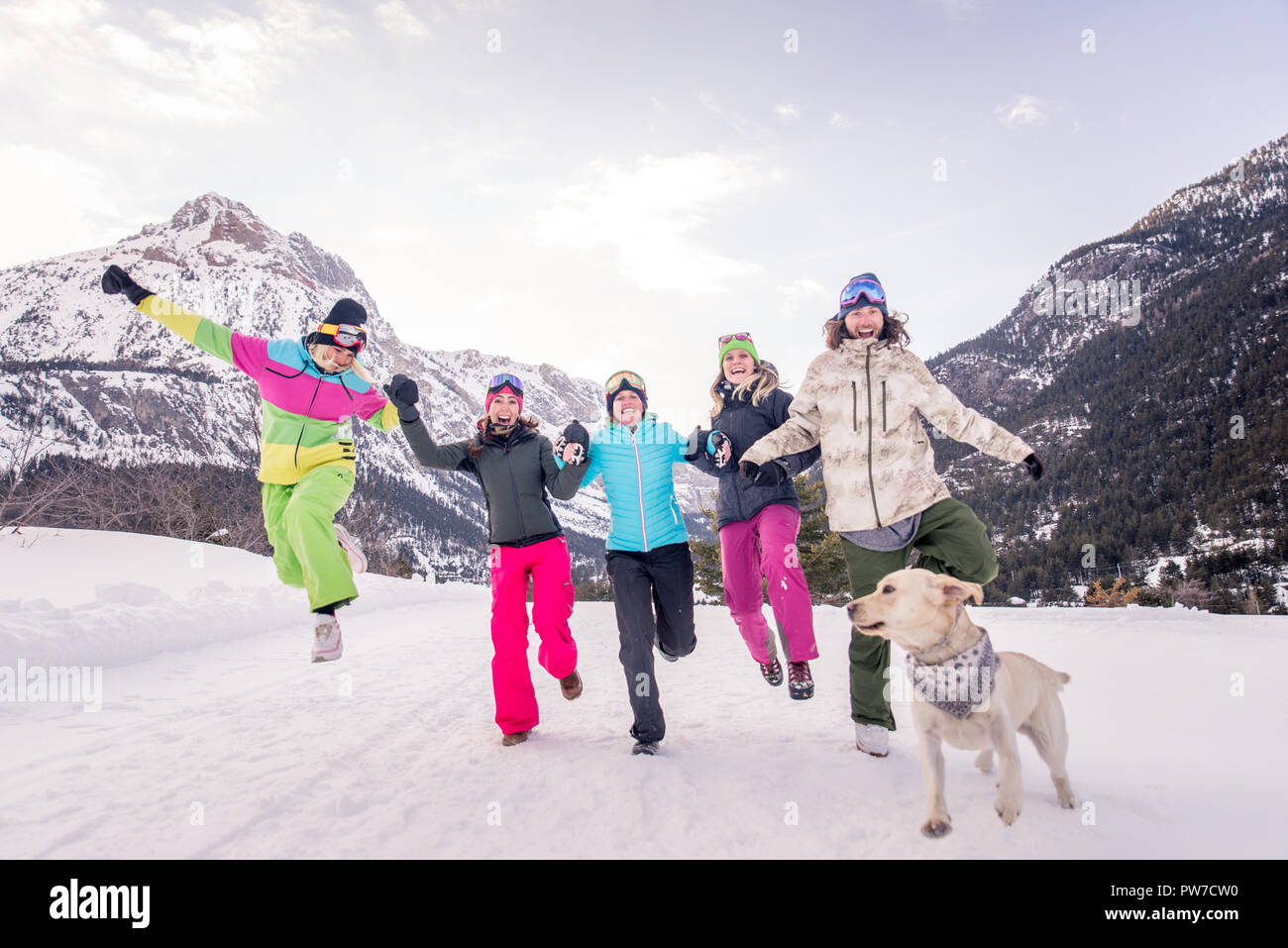 Happy group of people having fun on winter vacation - Friends witn snow ...