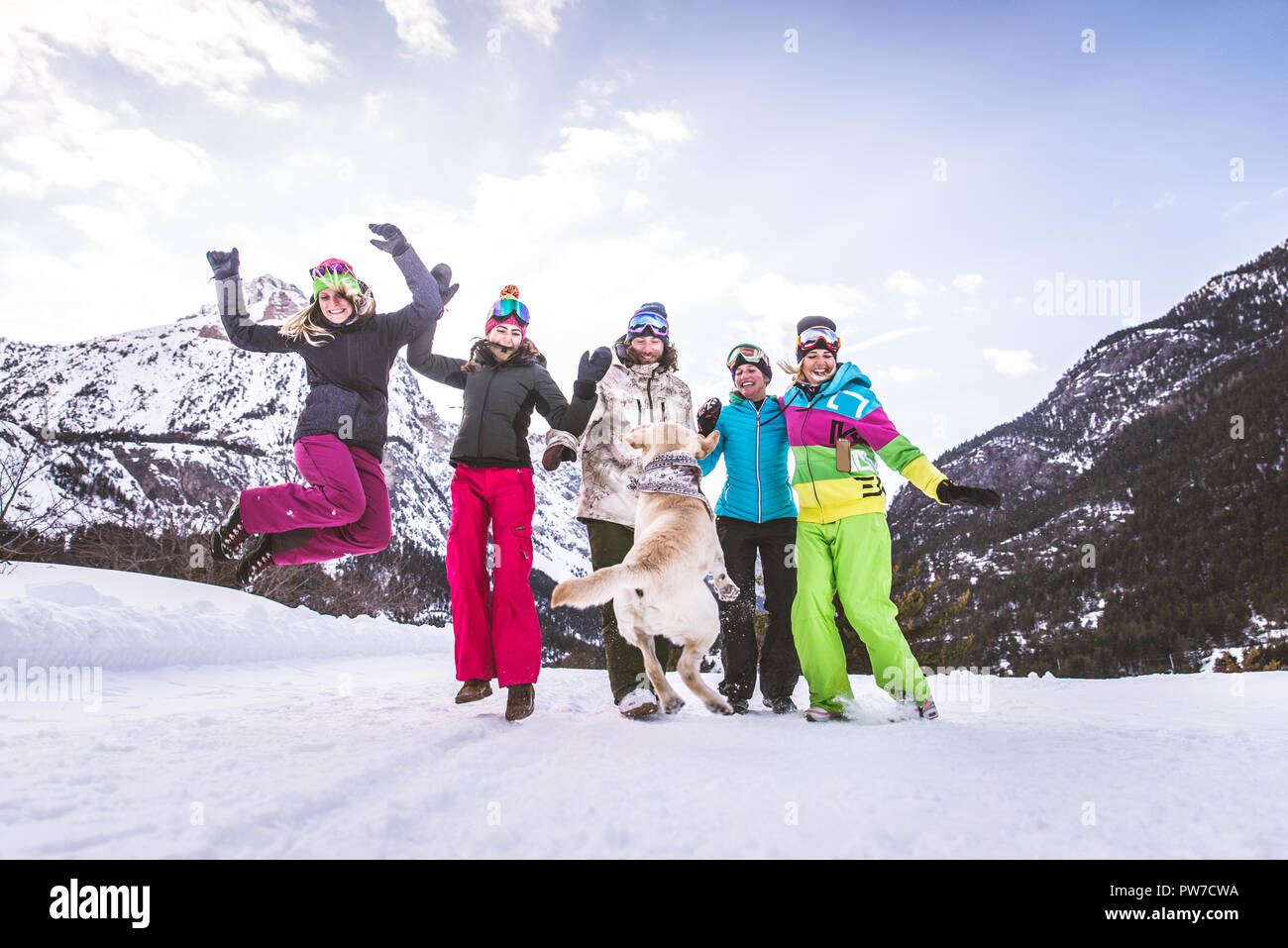 Happy group of people having fun on winter vacation - Friends witn snow ...