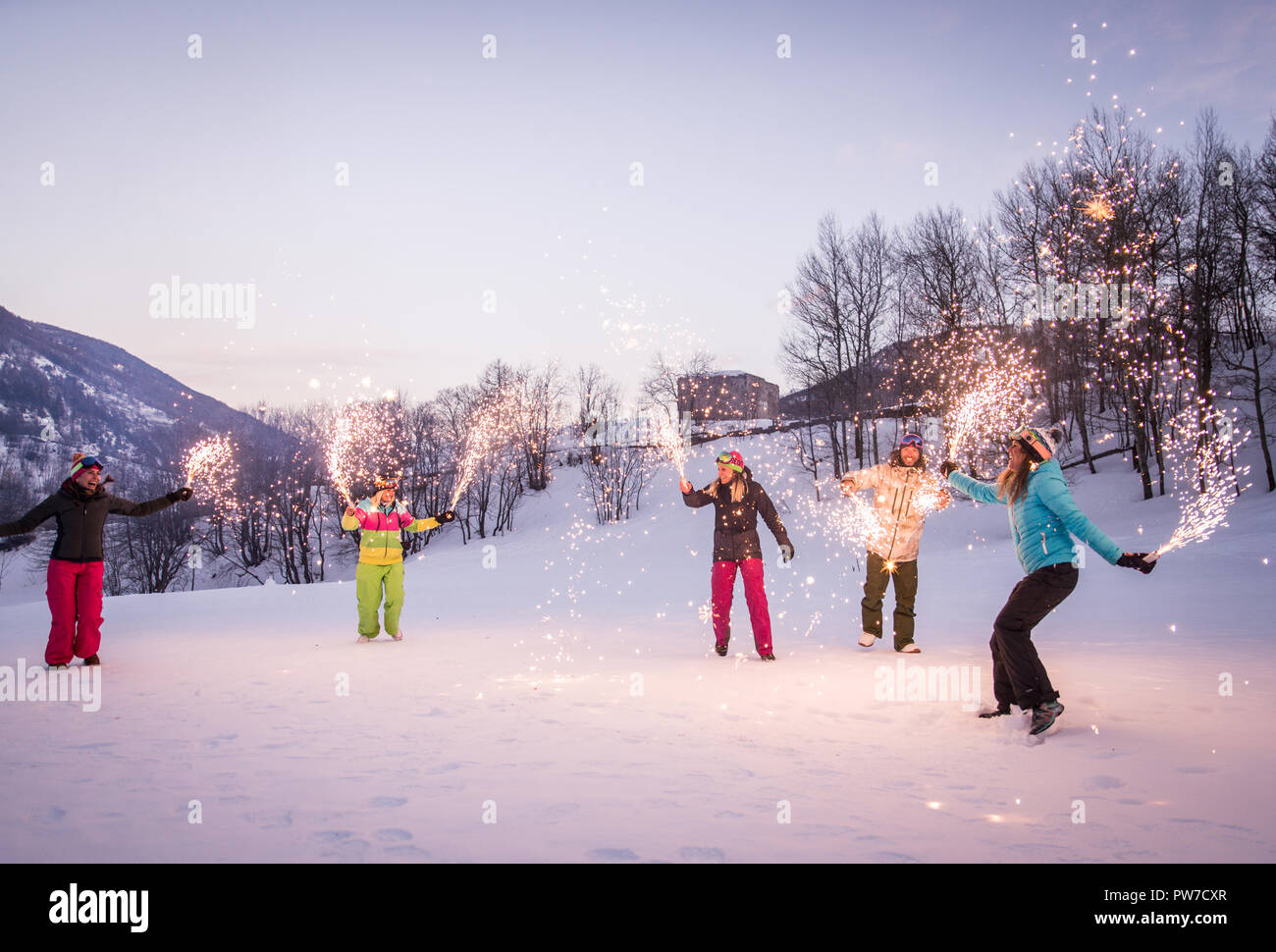 Happy group of people having fun on winter vacation - Friends witn snow ...