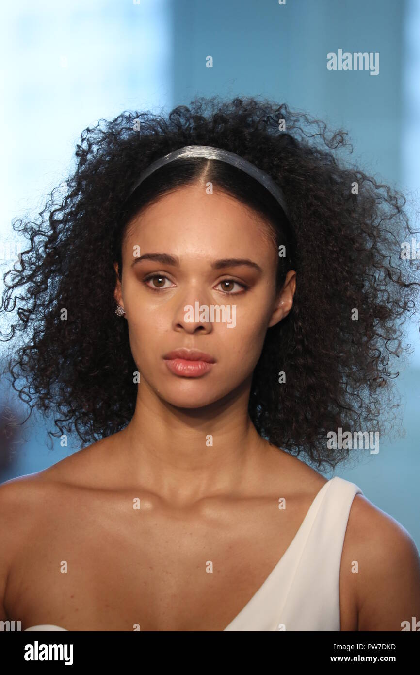 NEW YORK, NY - APRIL 13: Models walk the runway finale for the Justin ...