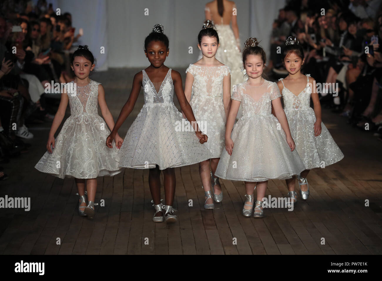 NEW YORK, NY - APRIL 13: Kid models walk the runway for the Berta ...