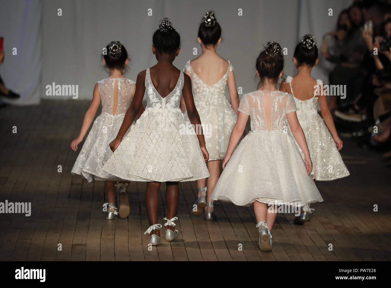 NEW YORK, NY - APRIL 13: Kid models walk the runway for the Berta ...