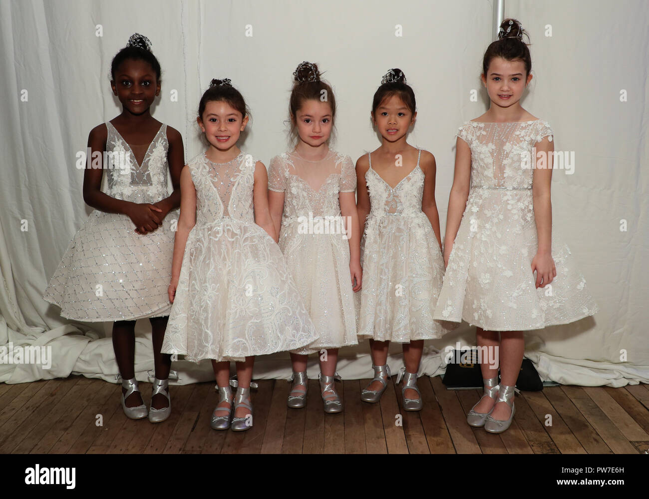 NEW YORK, NY - APRIL 13: Models posing backstage before the Berta ...