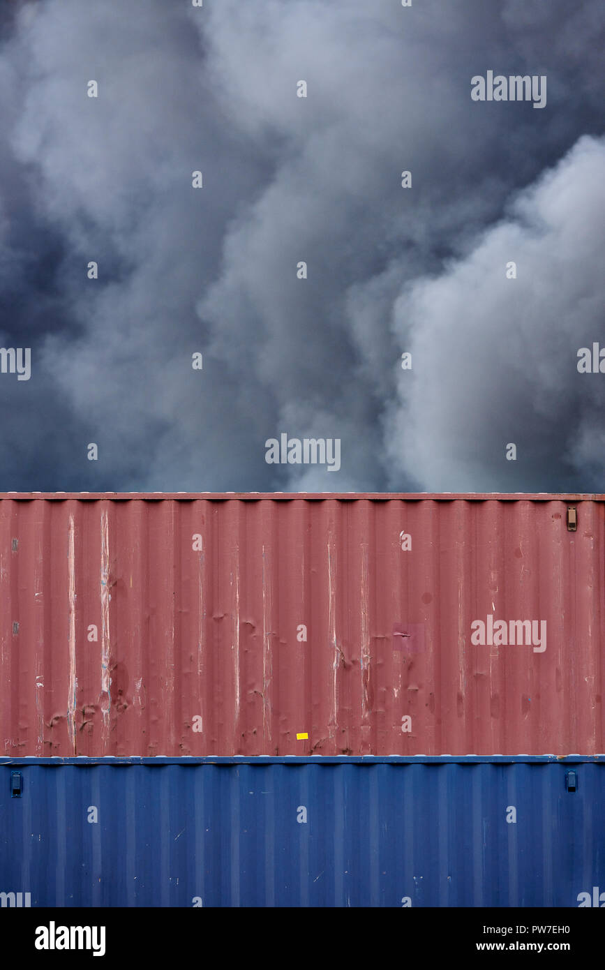Abstract graphic view of shipping containers with plumes of toxic smoke ...