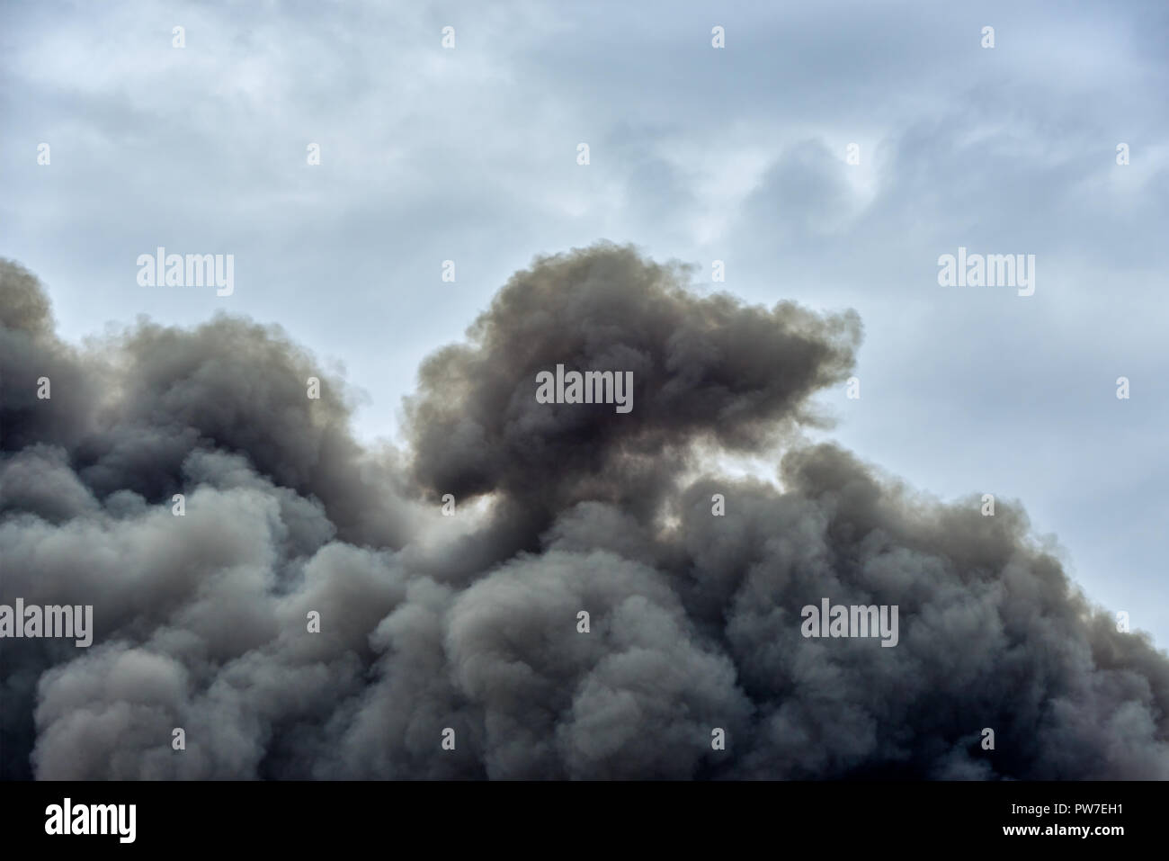 Forms and shapes in a cloud of toxic pollution smoke from a factory ...