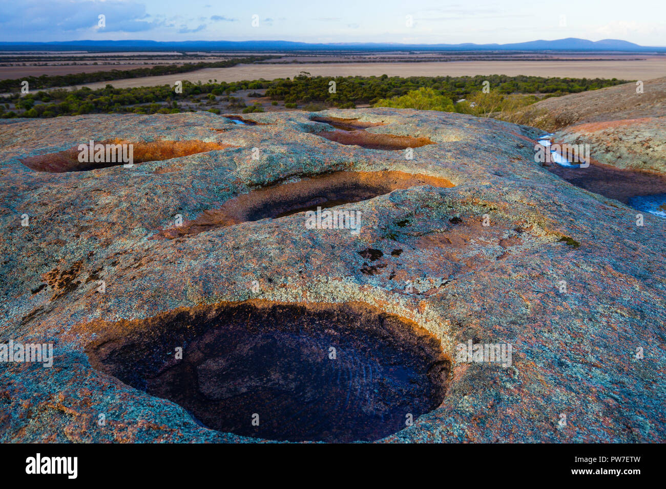 Shallow rock pools aka as gnamma holes by the aboriginals filled with ...