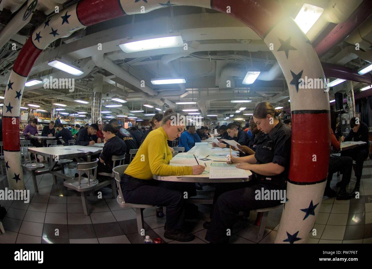 PHILIPPINE SEA (Sept. 21, 2017) Sailors take the Navy-wide E-4 ...