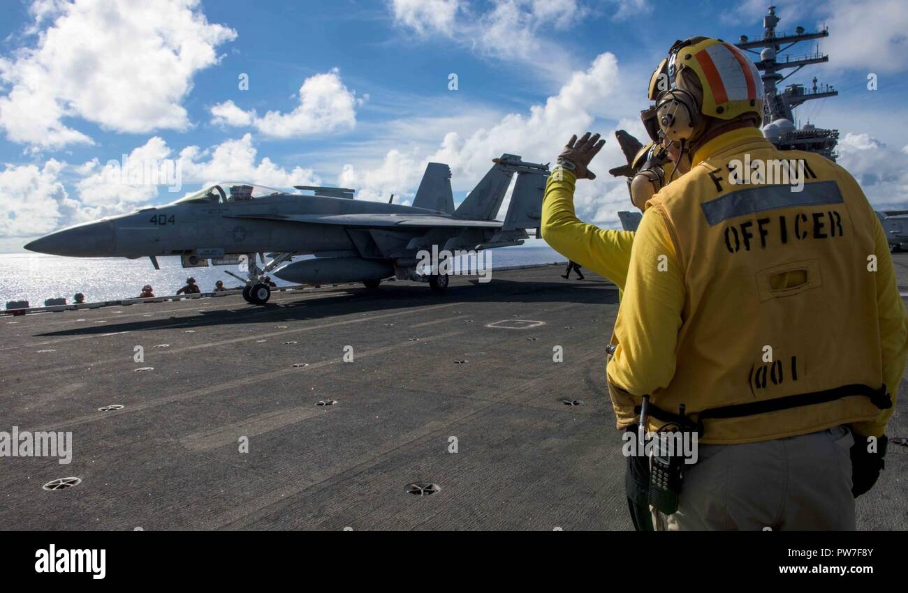 PHILIPPINE SEA (Sept. 20, 2017) Flight Deck Officer Lt. Brian Lewis ...
