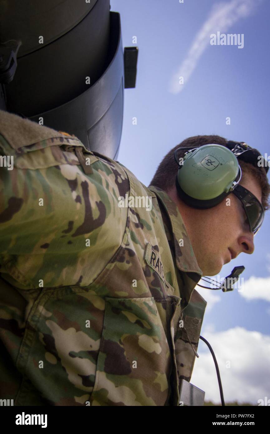 Students of Air Assault class 307-17 rappel from a helicopter to ...