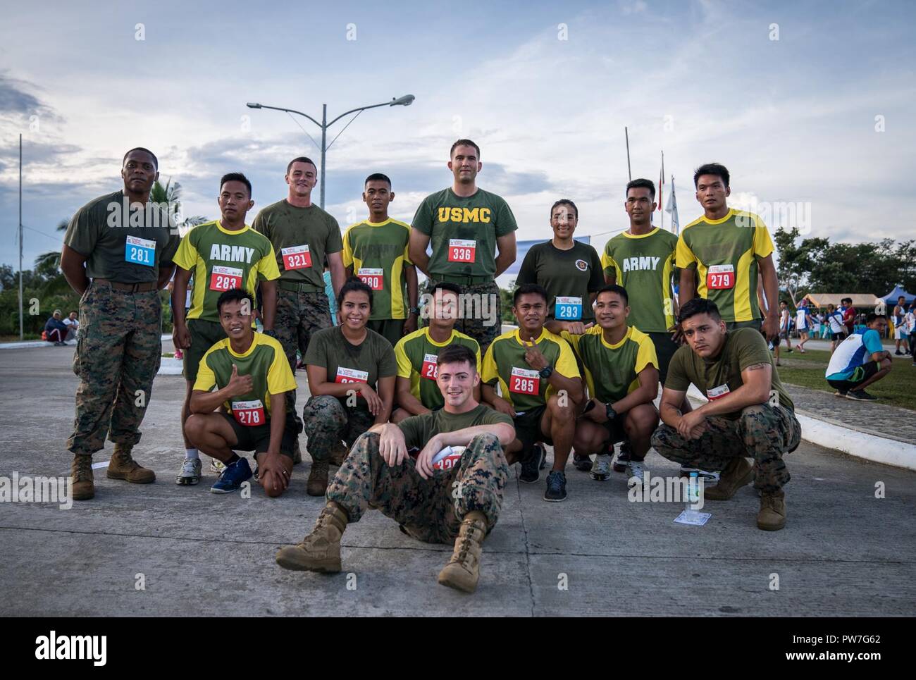 Members of the Philippine Army and U.S. Marine Corps gather together ...