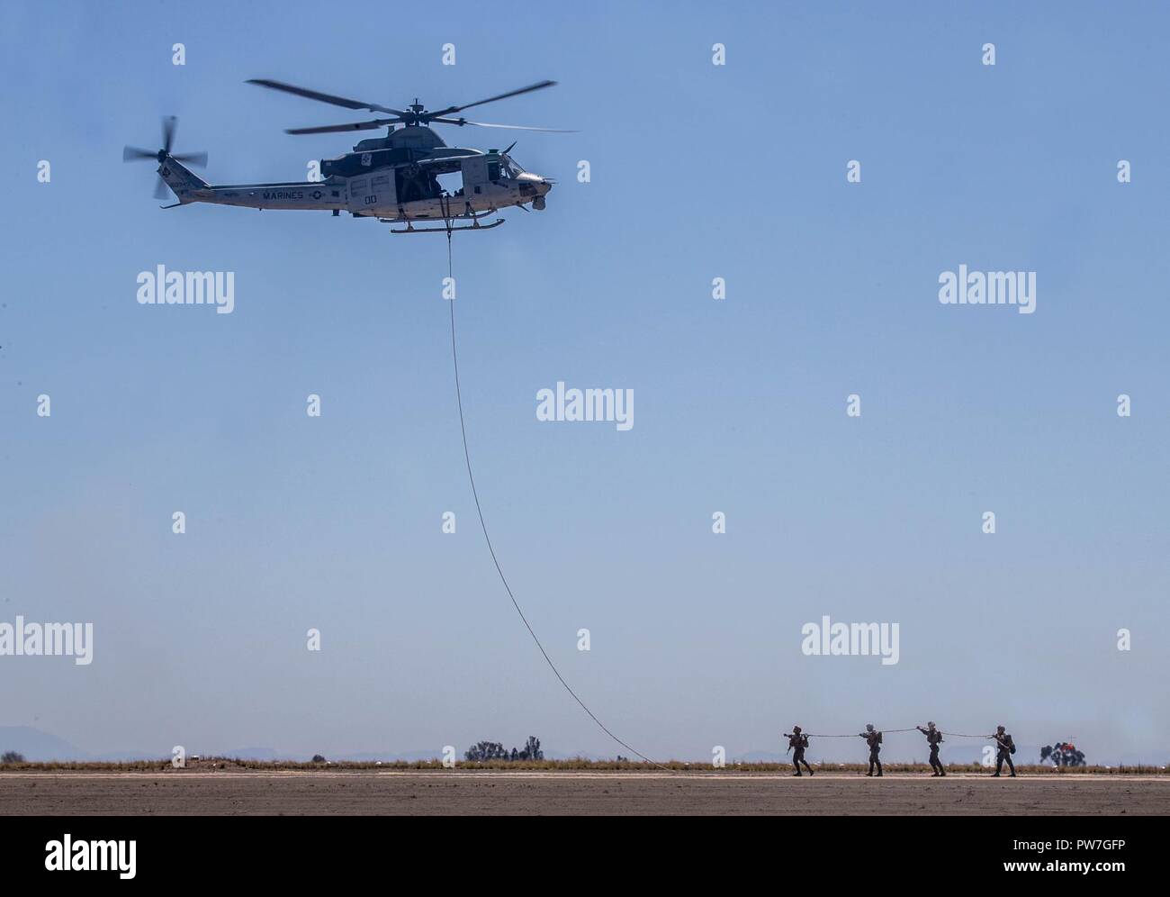 A UH-1Y Huey with the 3rd Marine Aircraft Wing prepares to lift Marines ...