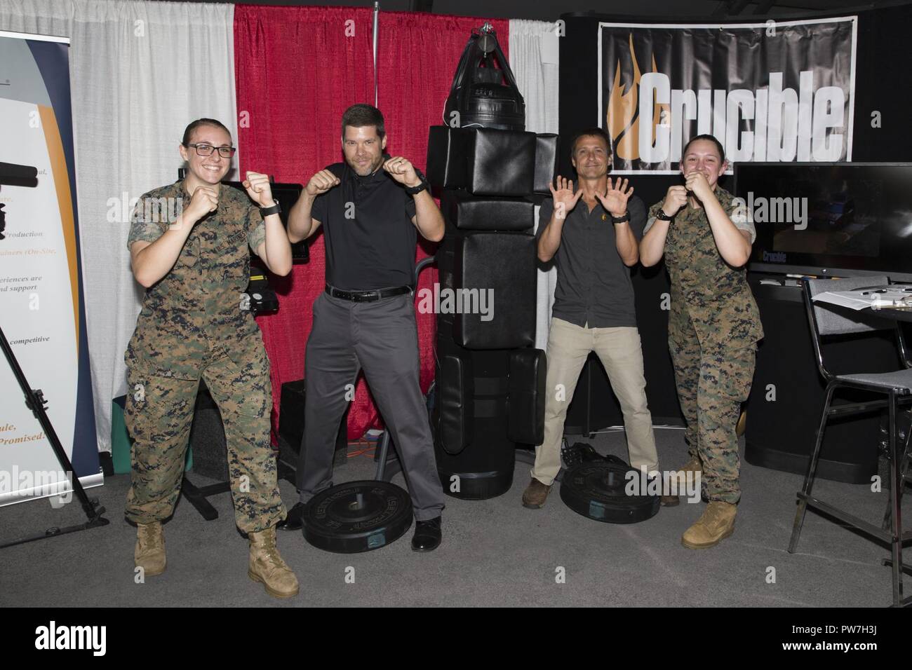From left, U.S. Marine Corps Pfc. Haley L. Buker, combat videographer ...