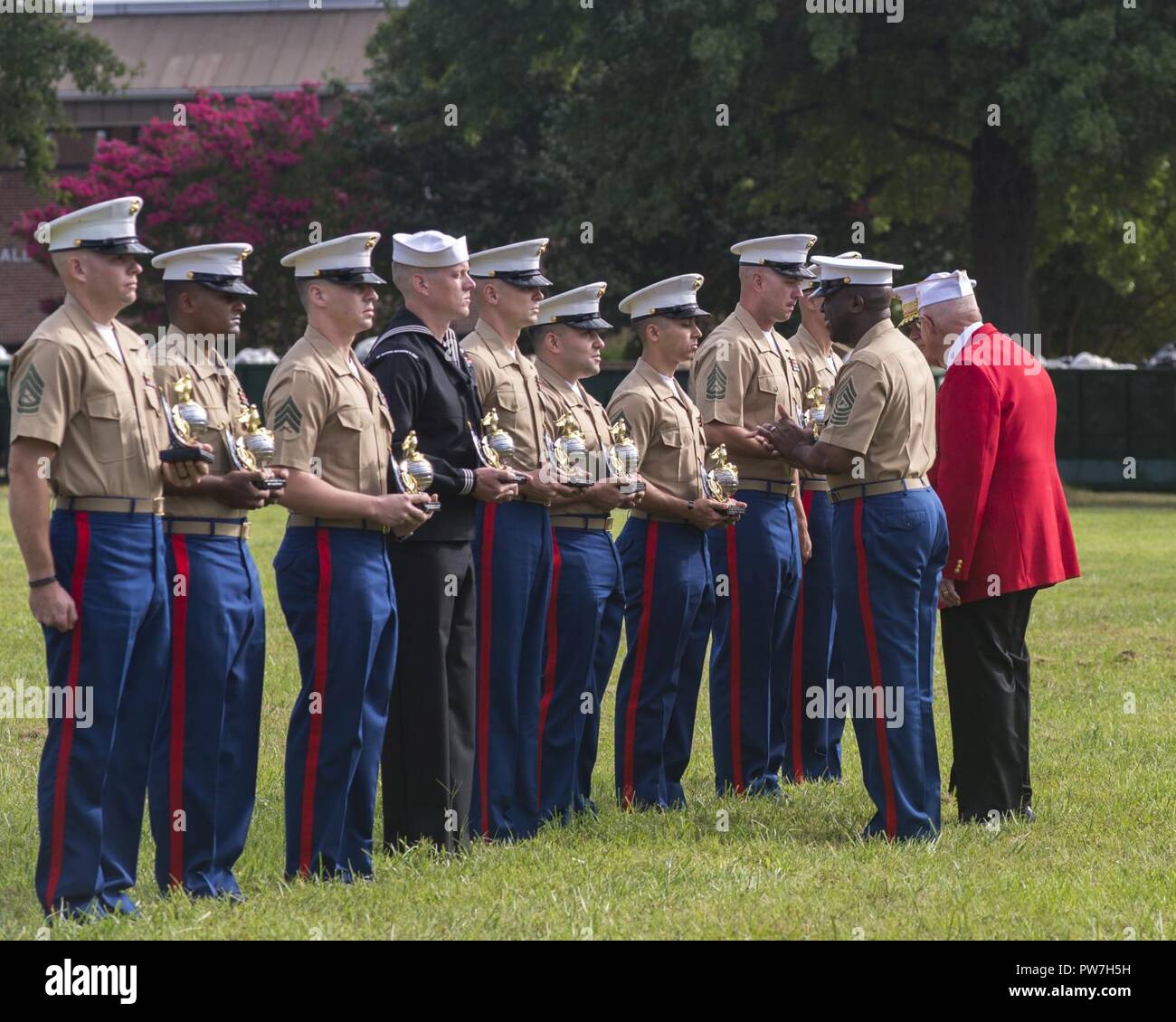 U.S. Marine Corps Gunnery Sgt. Mark Koerner receives the Marine Combat ...