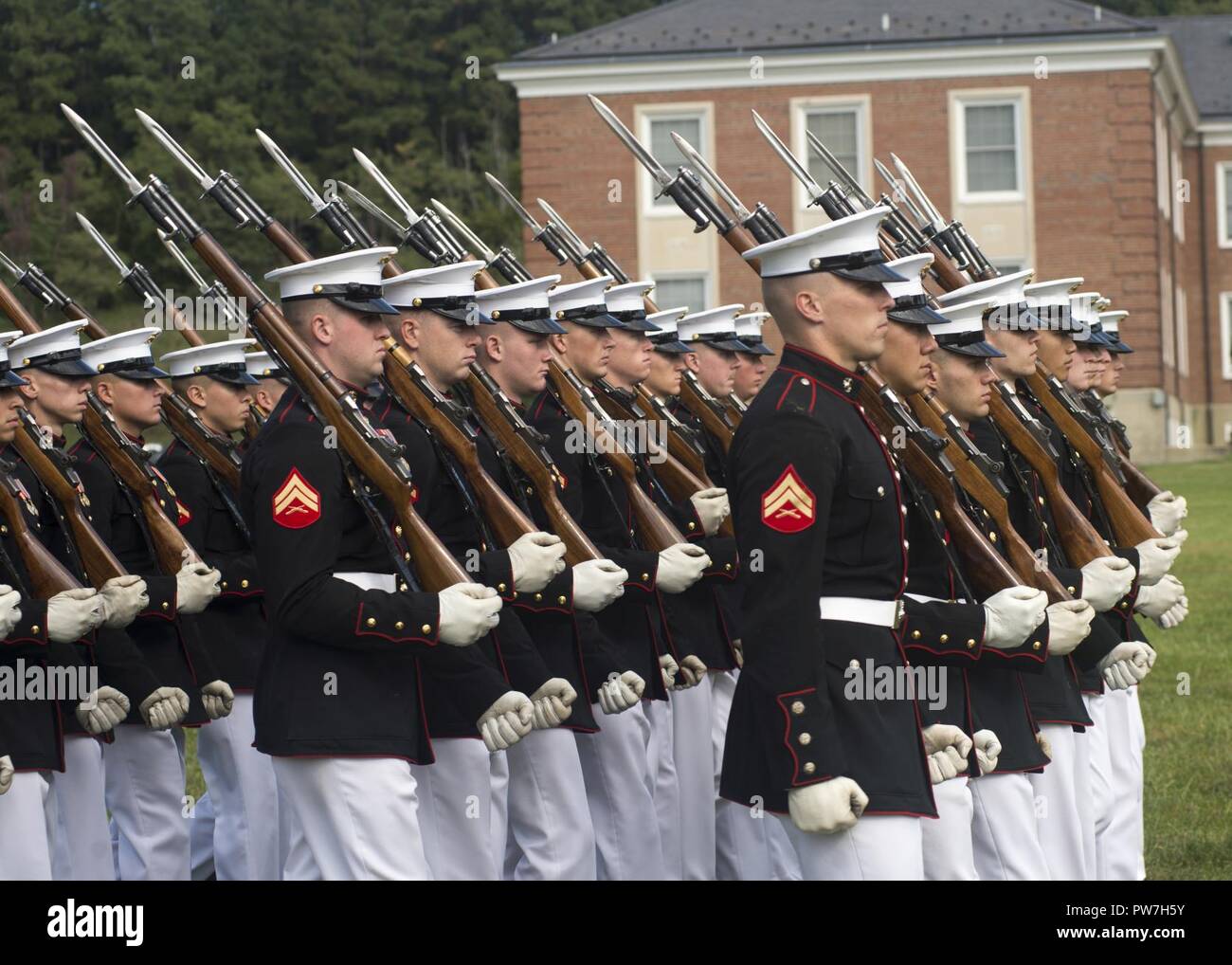 The U.S. Marine Corps Silent Drill Platoon march off during the 35th ...