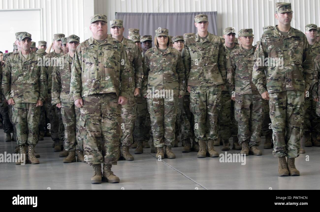 The 3637th Support Maintenance Co. stands at attention during the unit ...