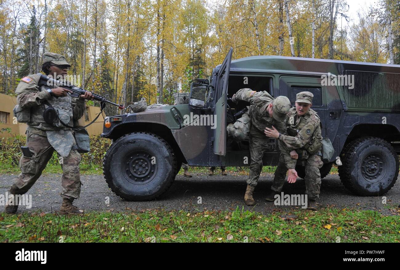 Spc. Shelbe Butner, right, assigned to the 109th Transportation Company ...