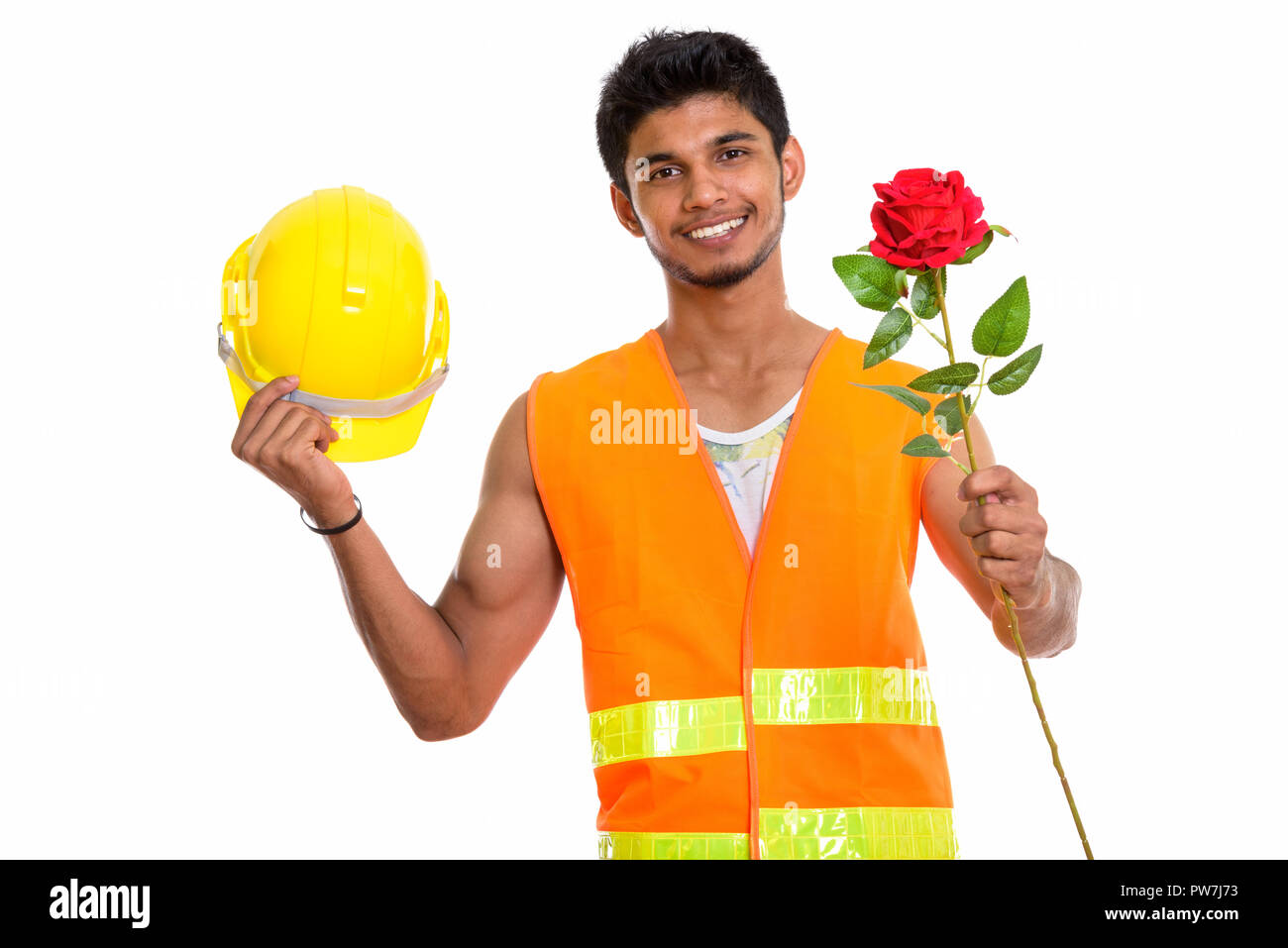 Young happy Indian man construction worker smiling while holding Stock ...