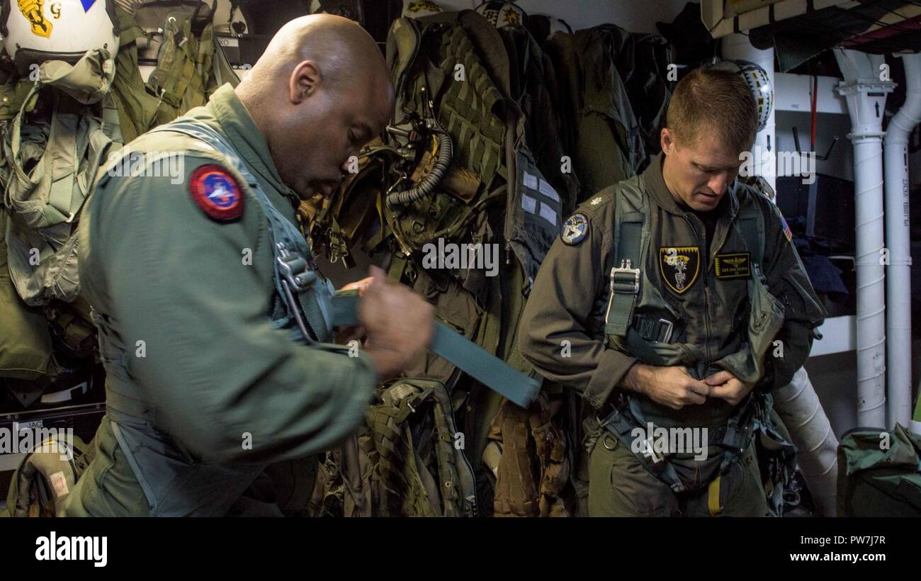 PHILIPPINE SEA (Sept. 24, 2017) – Cmdr. Alex Hampton, from Chicago, and ...