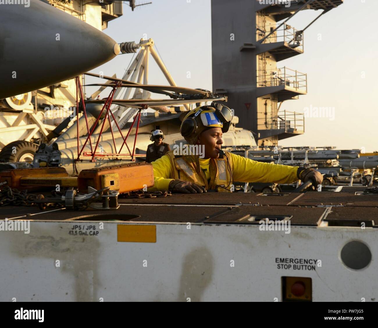 Us navy flight deck tractor hi-res stock photography and images - Alamy