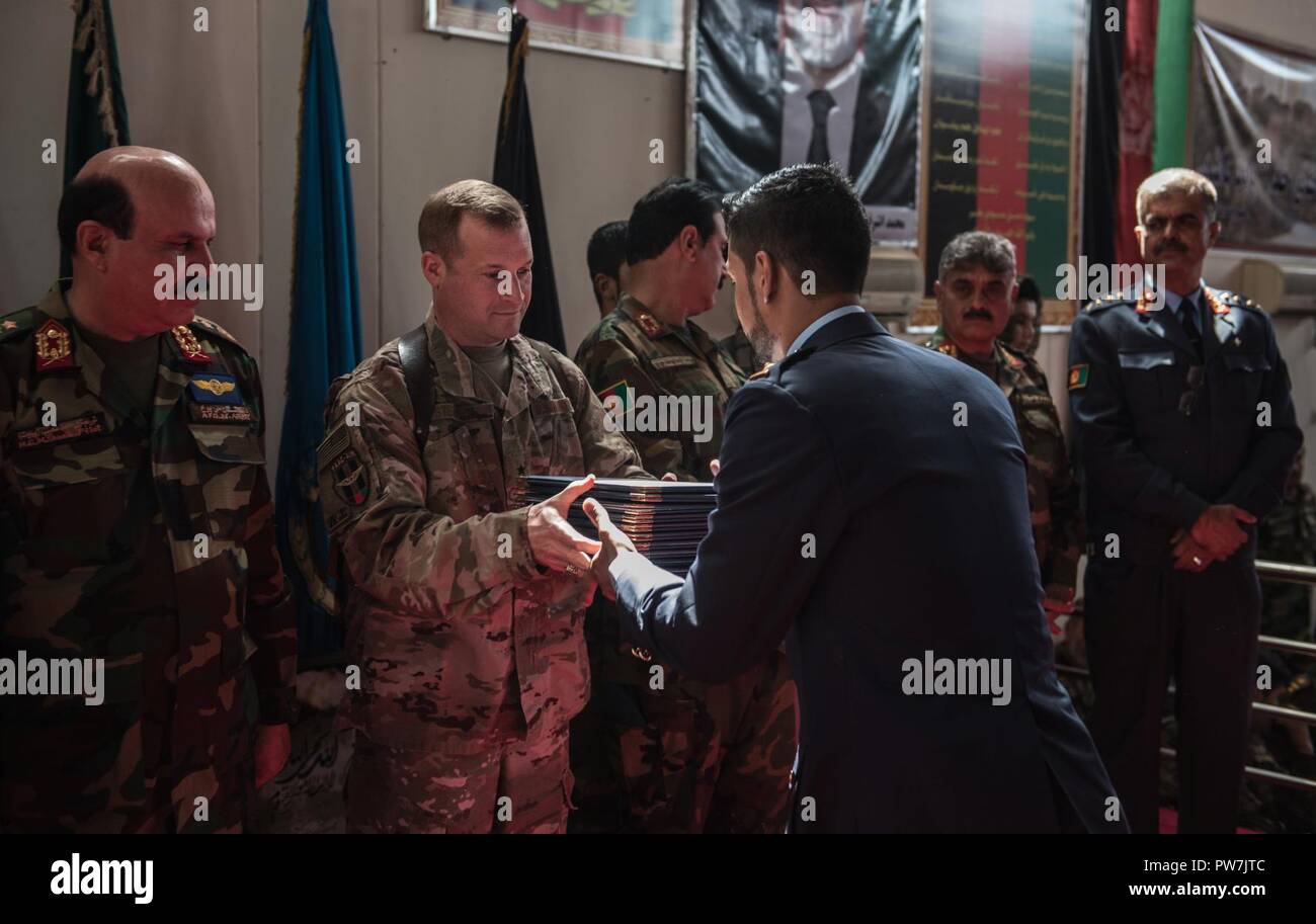A new Afghan Air Force lieutenant receives a set of Afghan Air Force ...