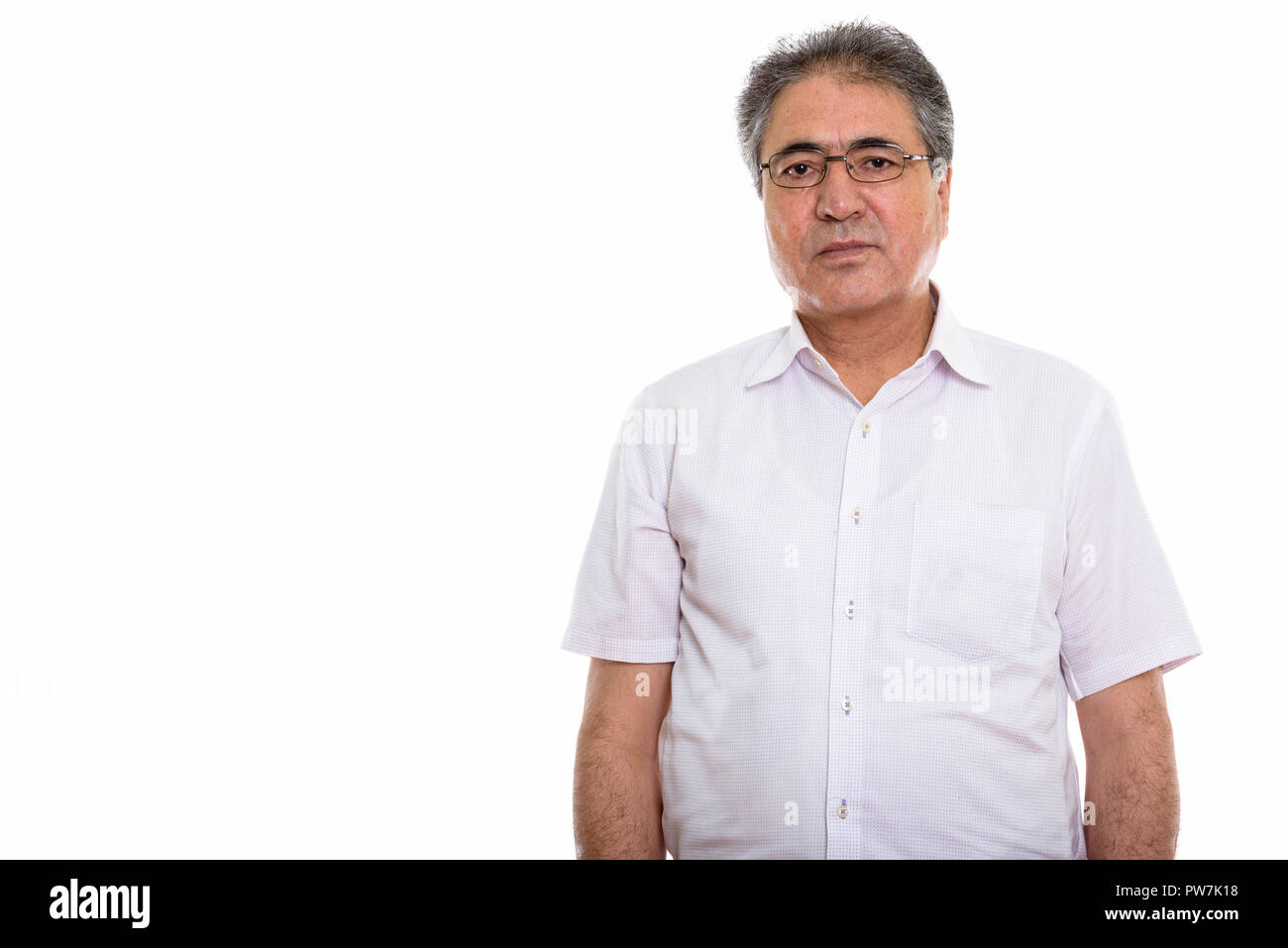 Studio shot portrait of senior Persian man Stock Photo - Alamy