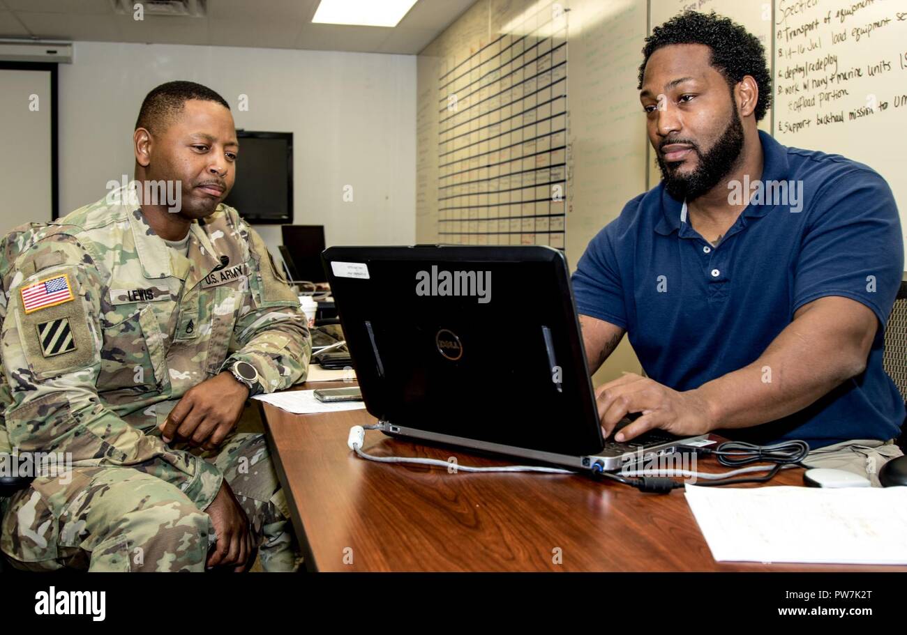 U.S. Army Staff Sgt. Christopher D. Lewis (left), Chemical, Biological ...