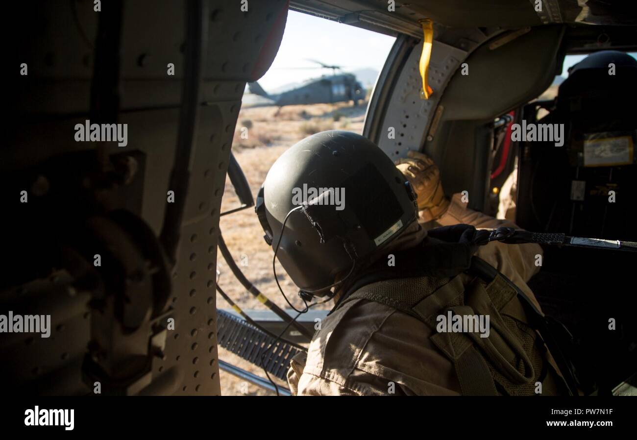 A United Arab Emirates (UAE) soldier with UAE Joint Aviation Command ...