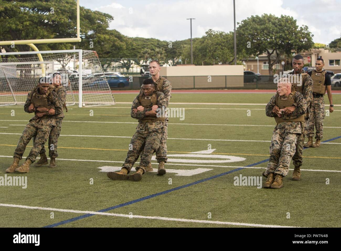 U.S. Marines conduct a buddy drag exercise during a Martial Arts ...