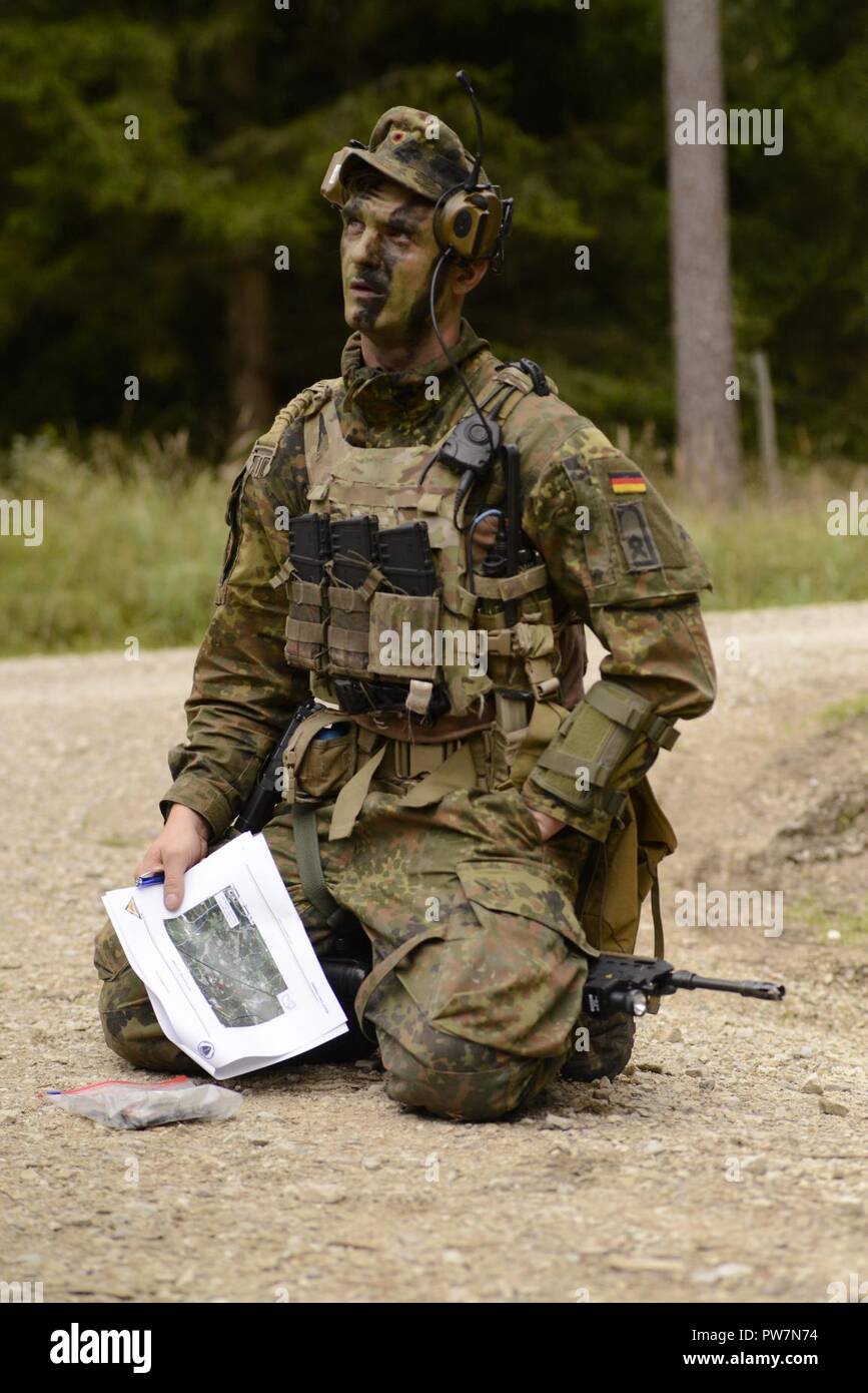 A German soldier receives a brief during the European Best Sniper Squad ...