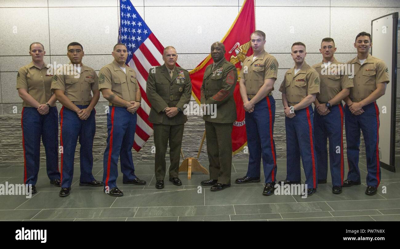 Commandant of the Marine Corps Gen. Robert B. Neller, left center, and ...
