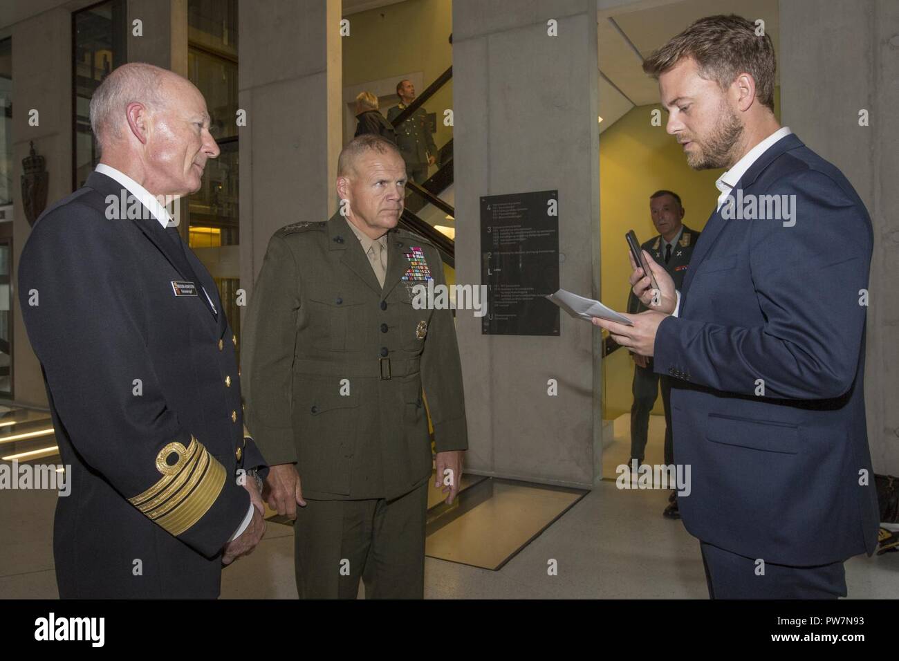 Commandant of the Marine Corps Gen. Robert B. Neller, center, is ...