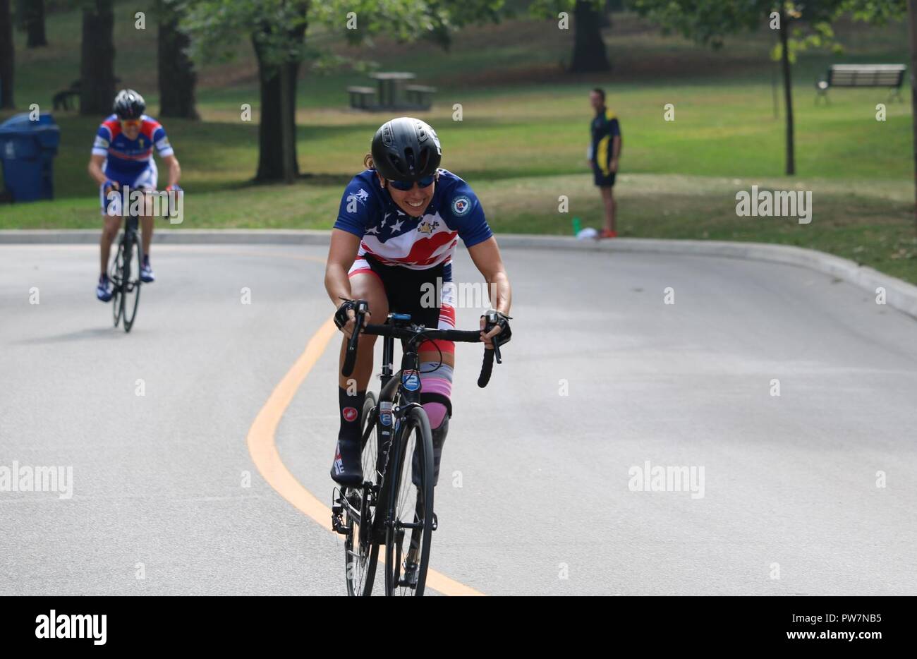 U.S. Army Capt. Kelly Elmlinger powers her way up a tough incline ...