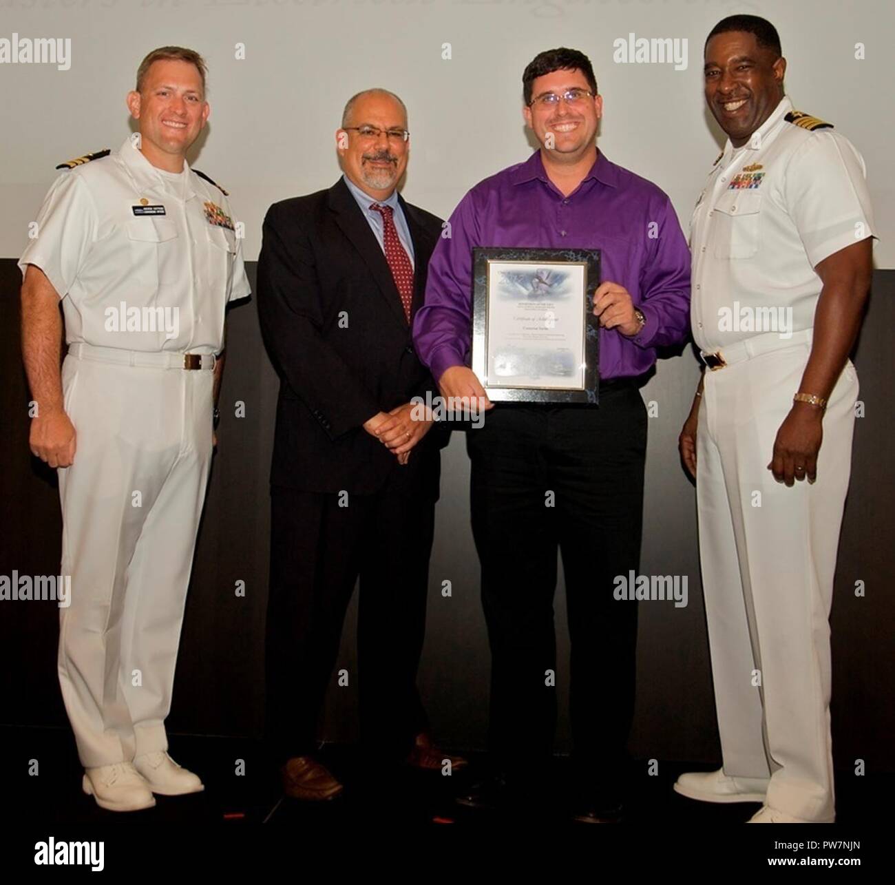 DAHLGREN, Va. - Cameron Sorlie receives his certificate of achievement ...
