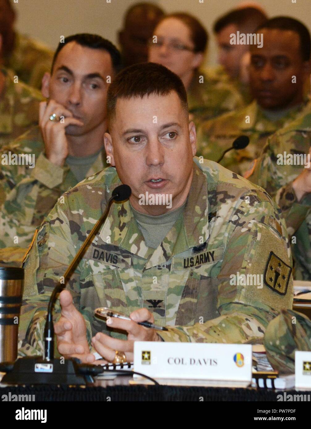 Col. Sean Davis, commander, 59th Ordnance Brigade, provides input ...