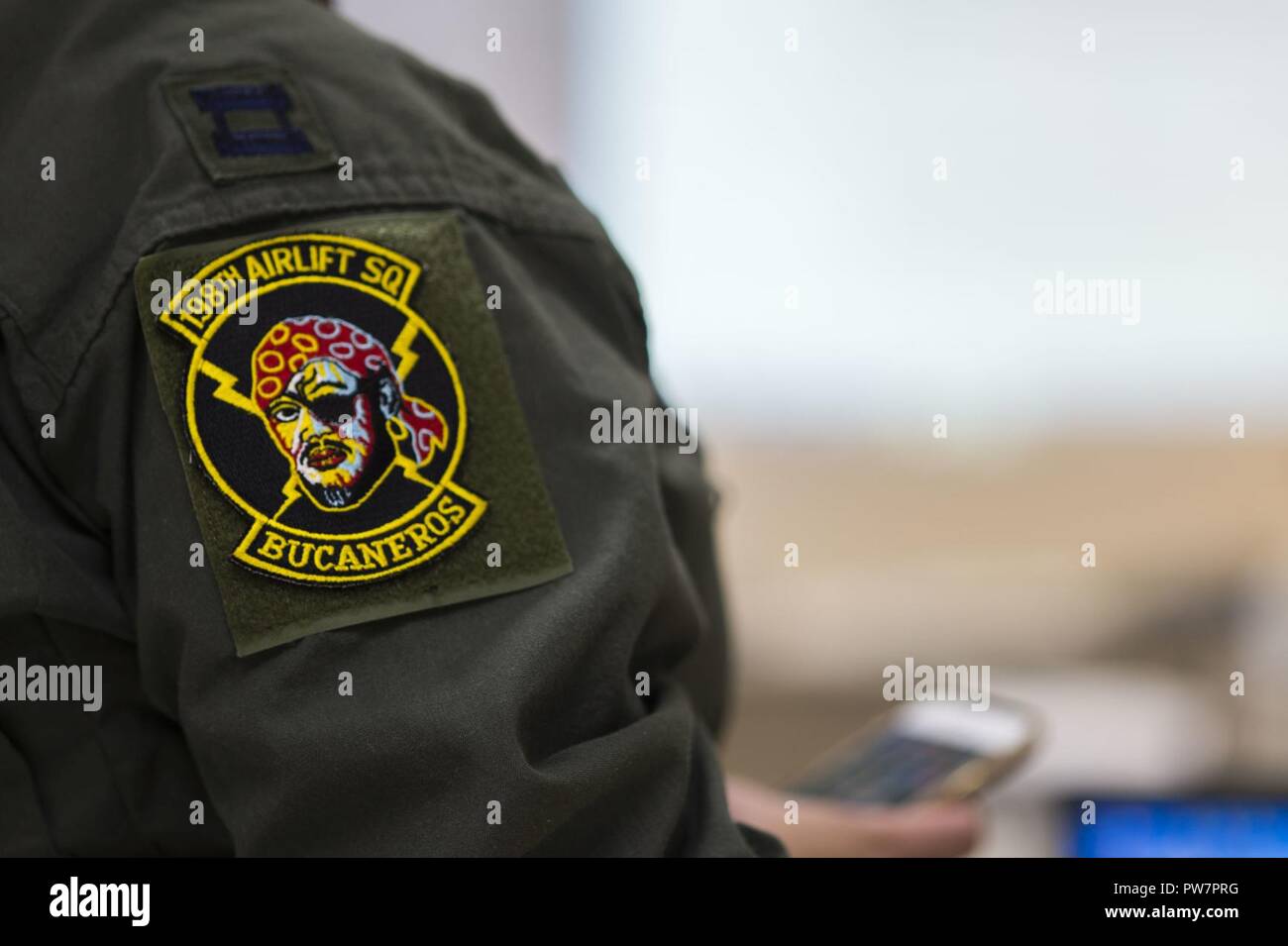 U.S. Airmen from the 156th Airlift Wing, Puerto Rico Air National Guard ...